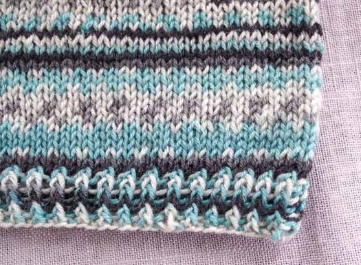 Knitting a rolled ribbing neckline - KNITmuch